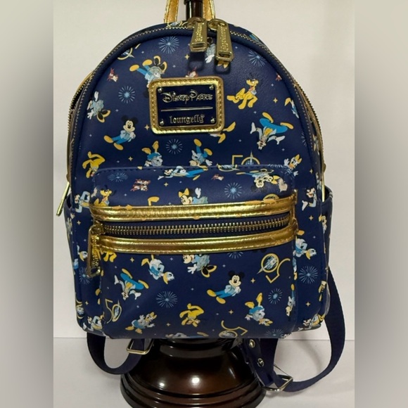 Loungefly | Bags | Disney Loungefly Parks Mini Backpack 5th Anniversary ...